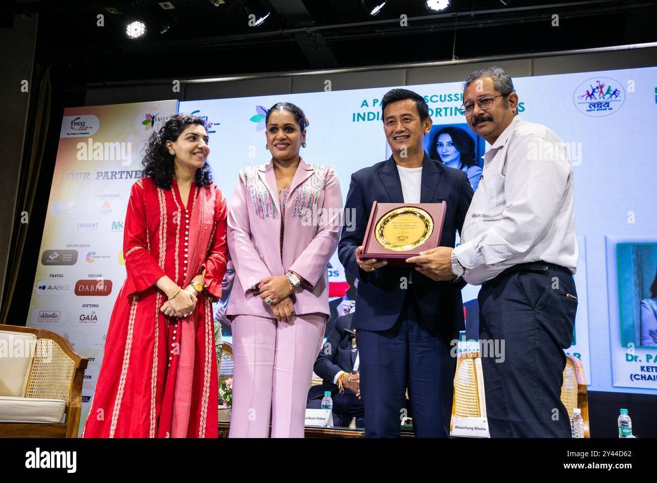 NEW DELHI, INDIA - SEPTEMBER 11: Bhaichung Bhutia (Football) (2R), with Payal Kanodia, (2L ...