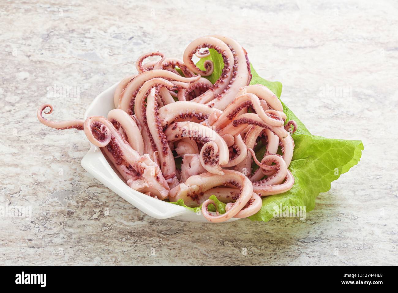 Marinated squid kalamri tentacles in the bowl Stock Photo - Alamy