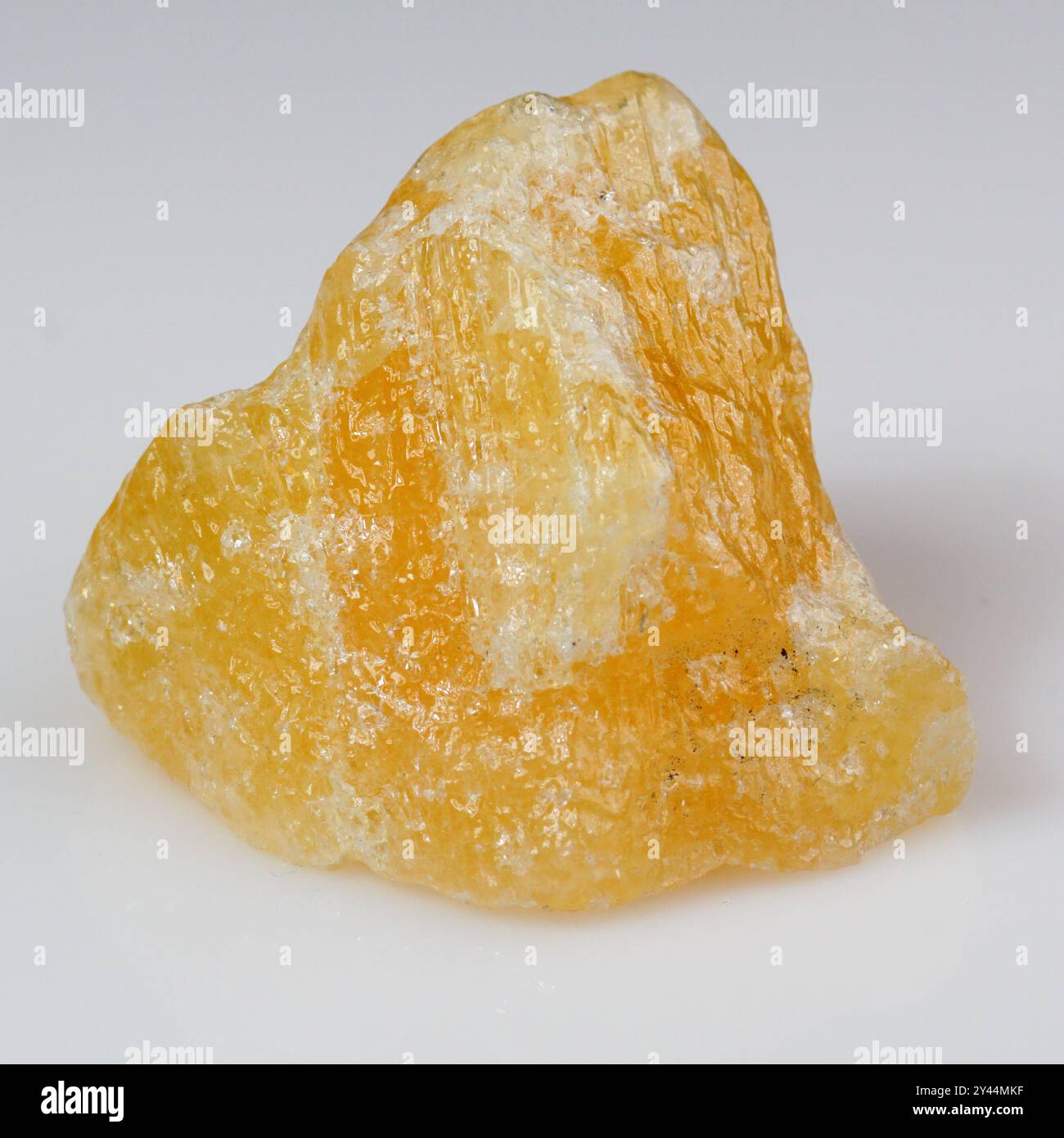 Radiant Yellow Calcite Mineral Specimen on Pristine White Background ...