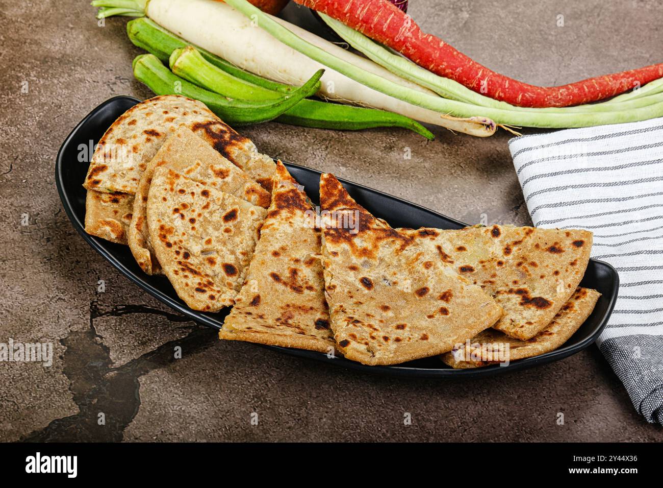 Indian vegetarian Aloo Paratha - bread with potato Stock Photo - Alamy