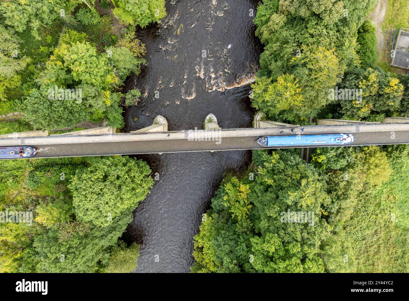 Narrow boats pass over the Pontcysyllte Aqueduct in North Wales, its 19 ...