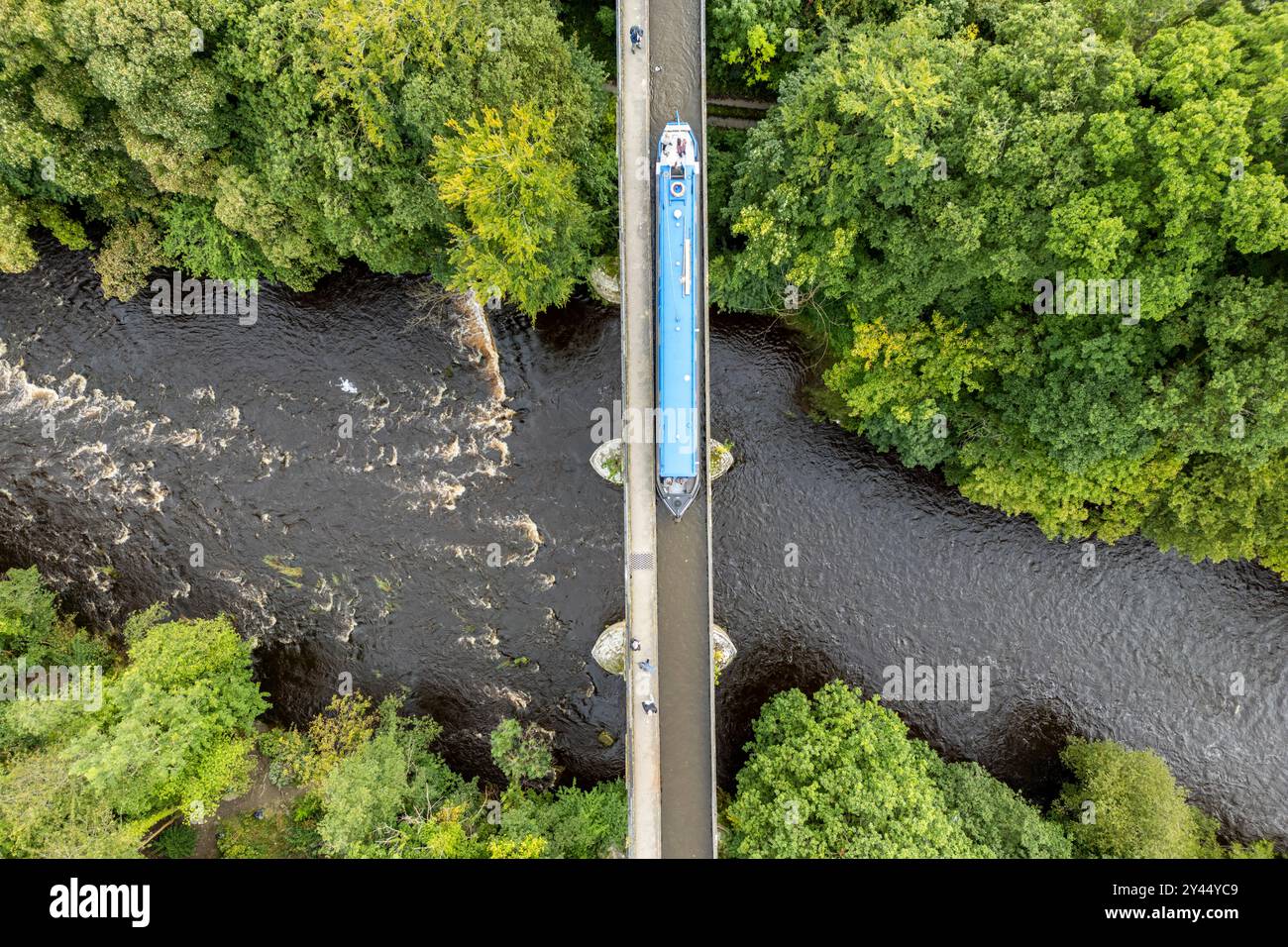 Narrow boats pass over the Pontcysyllte Aqueduct in North Wales, its 19 ...