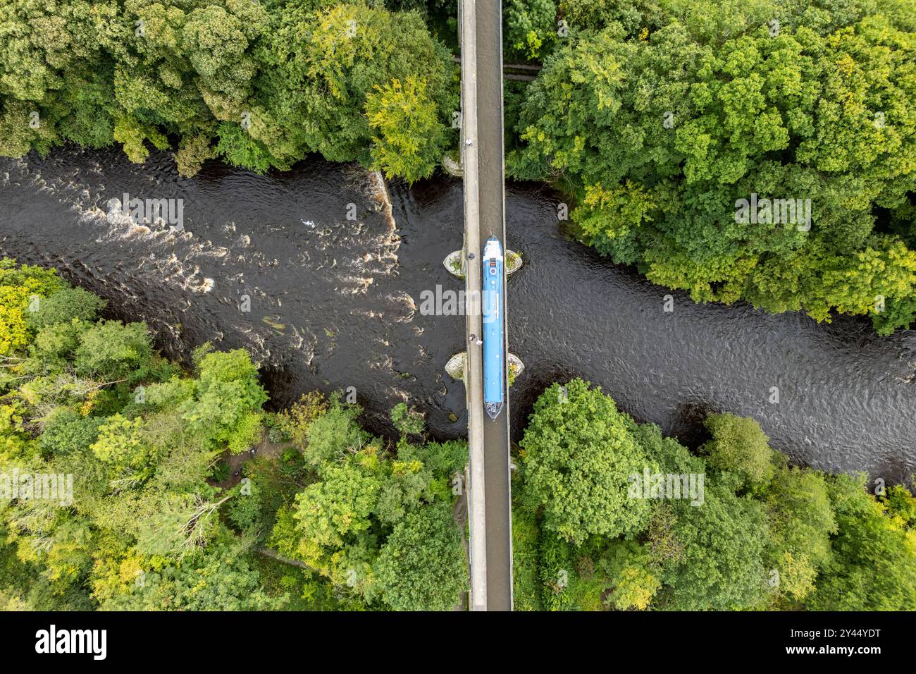Narrow boats pass over the Pontcysyllte Aqueduct in North Wales, its 19 ...