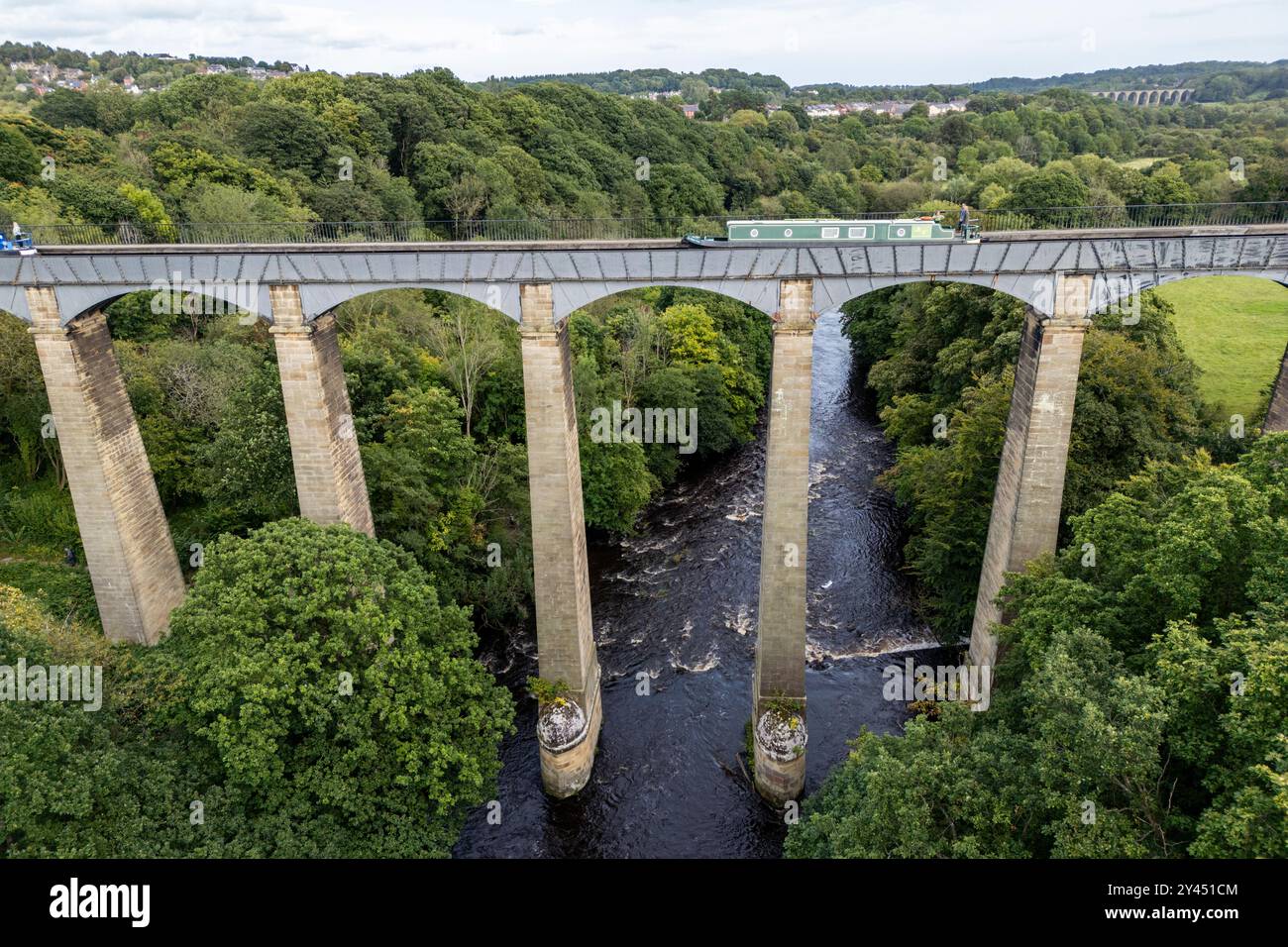 Narrow boats pass over the Pontcysyllte Aqueduct in North Wales, its 19 ...