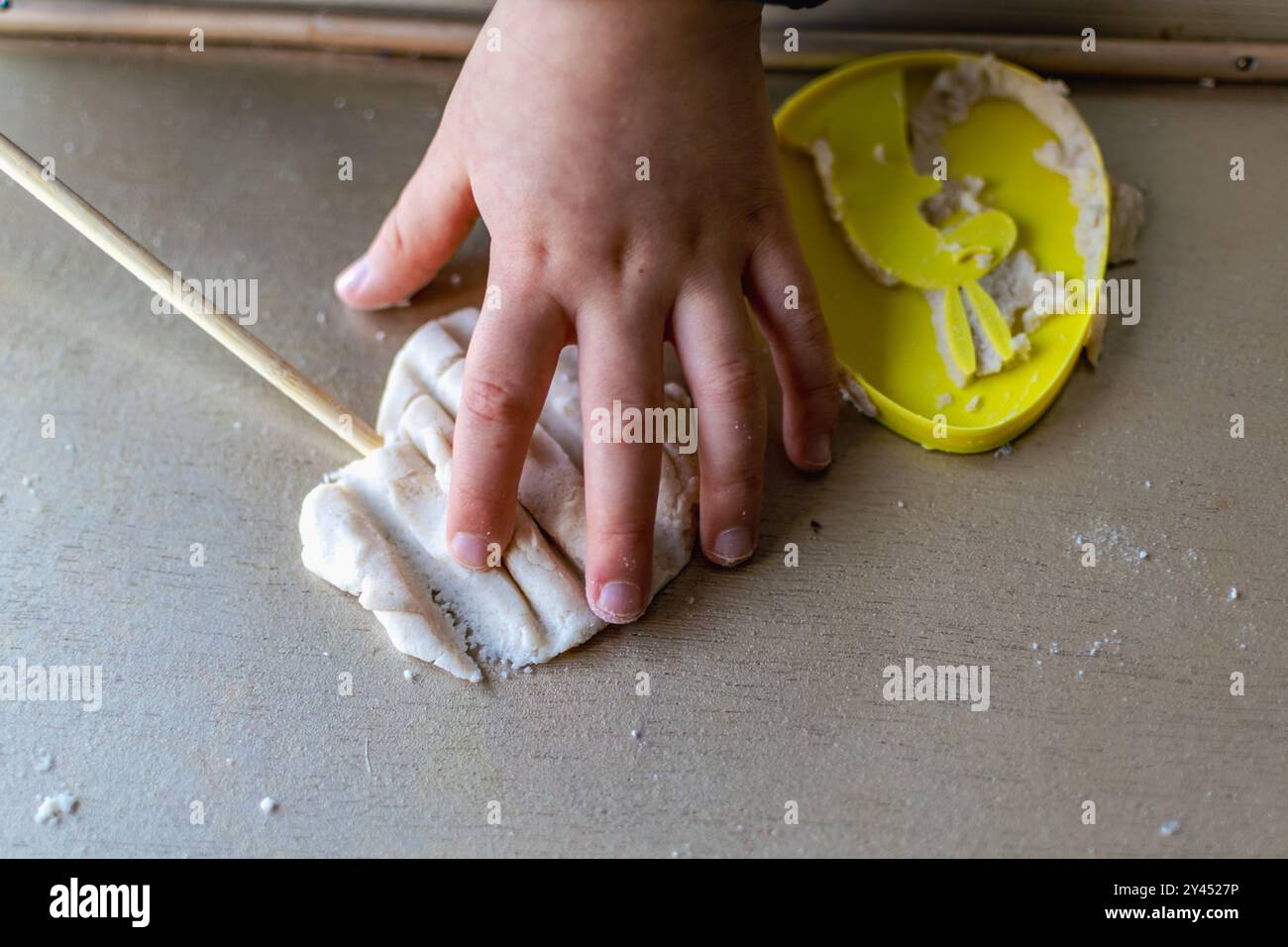 Child having fun modeling salt dough, authentic activity, fine motor ...