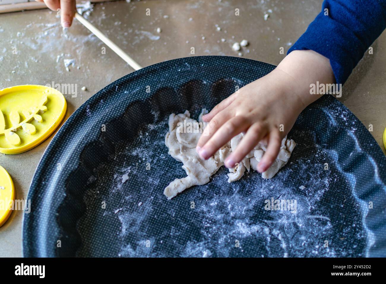 Child having fun modeling salt dough, authentic activity, fine motor ...