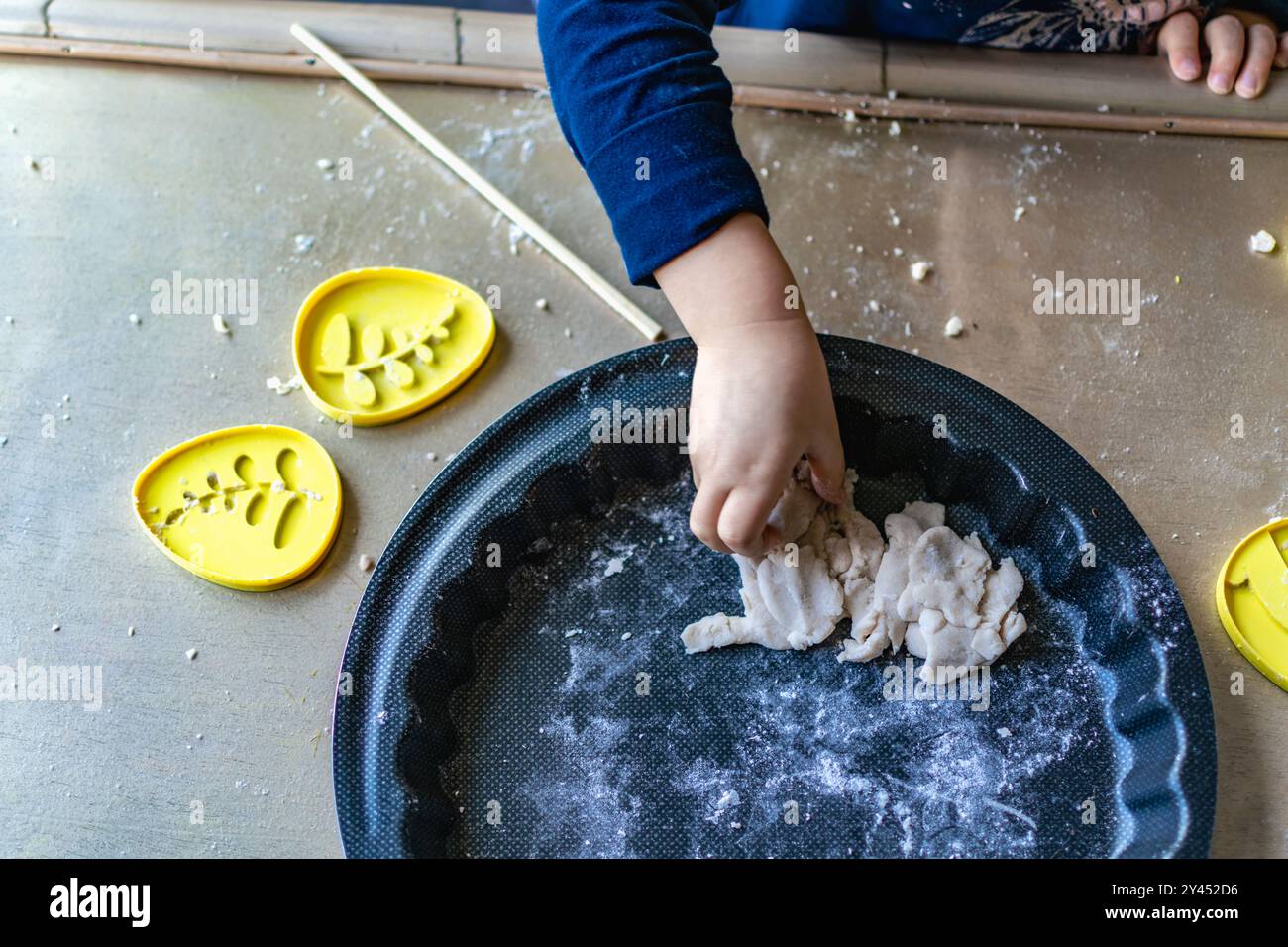 Child having fun modeling salt dough, authentic activity, fine motor ...