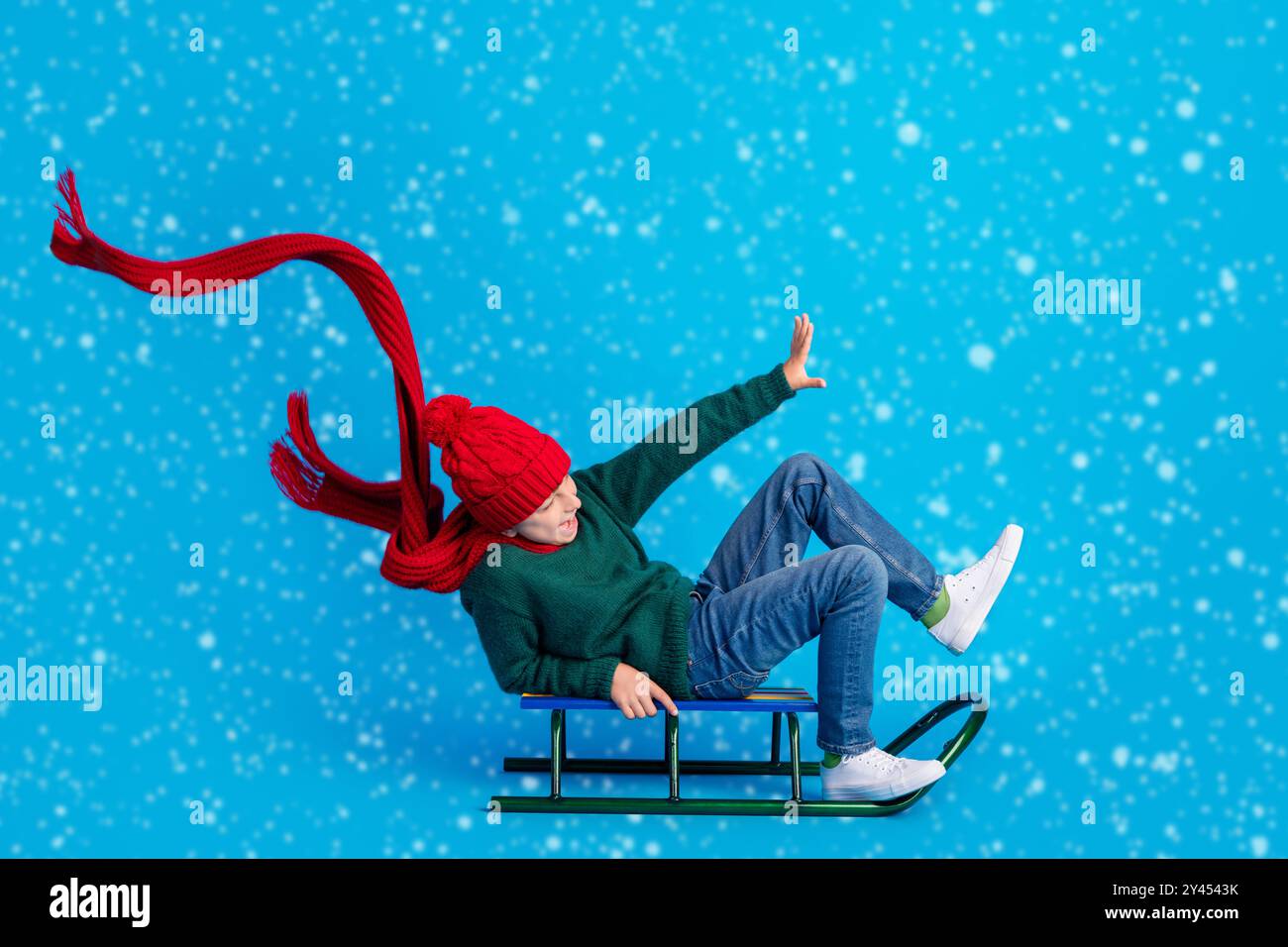 Full length body size photo boy riding sledges looking copyspace ...