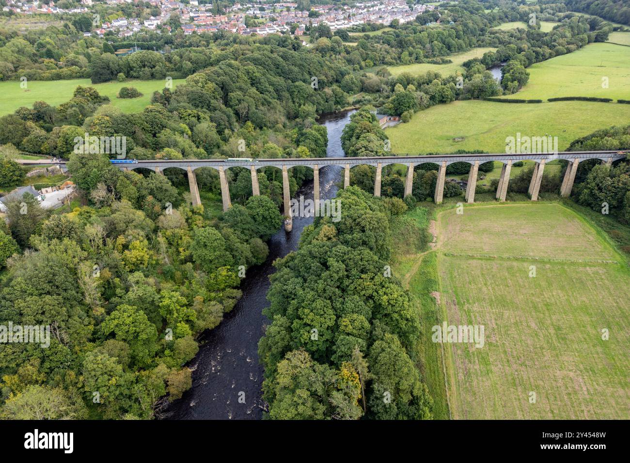 Narrow boats pass over the Pontcysyllte Aqueduct in North Wales, its 19 ...
