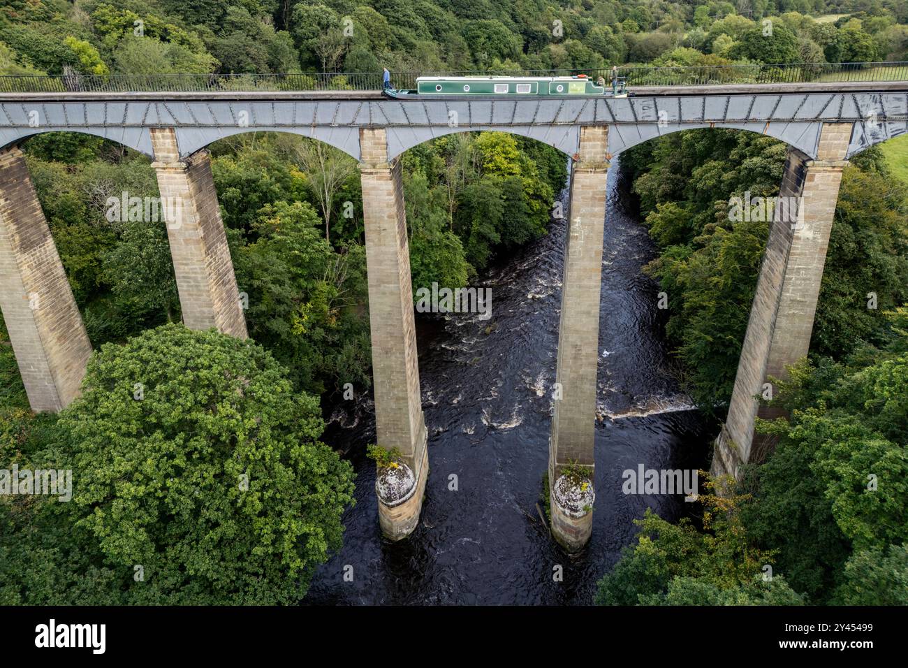Narrow boats pass over the Pontcysyllte Aqueduct in North Wales, its 19 ...