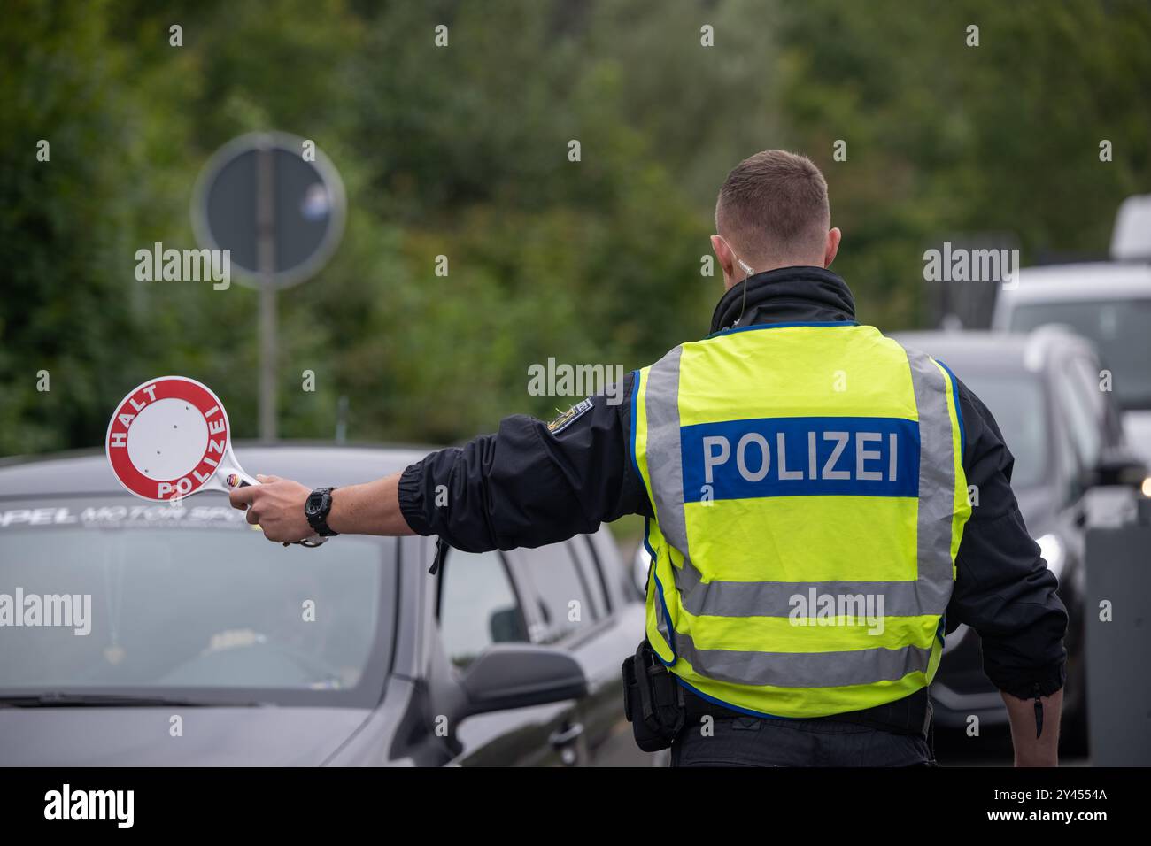 Trier, Germany. 16th Sep, 2024. Police officers stop vehicles on the ...