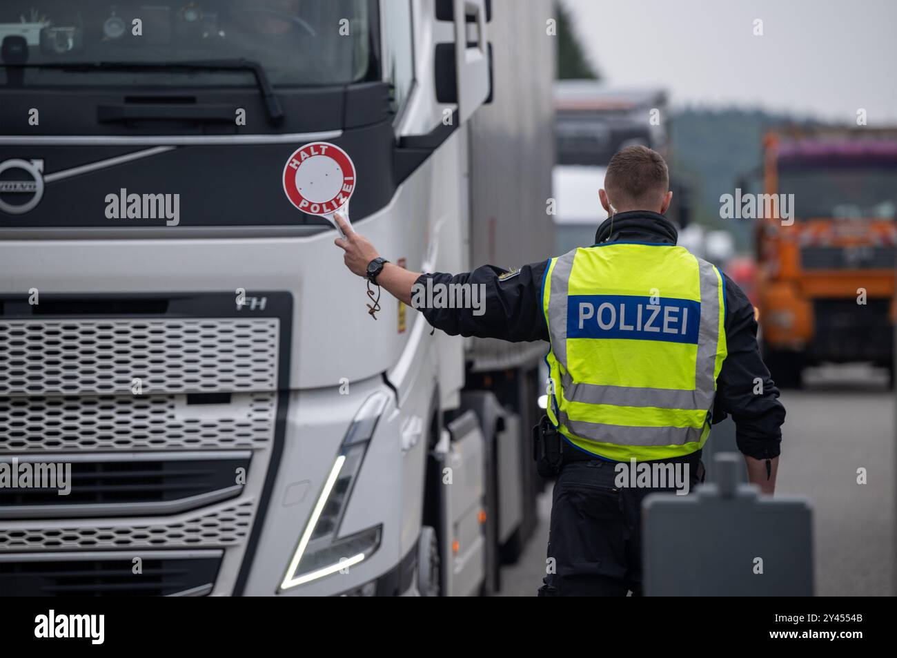 Trier, Germany. 16th Sep, 2024. Police officers stop vehicles on the ...