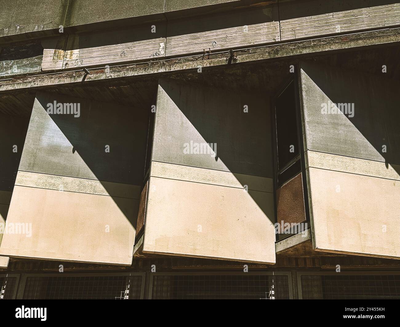 Concrete geometric structures with diagonal shadows in daylight ...