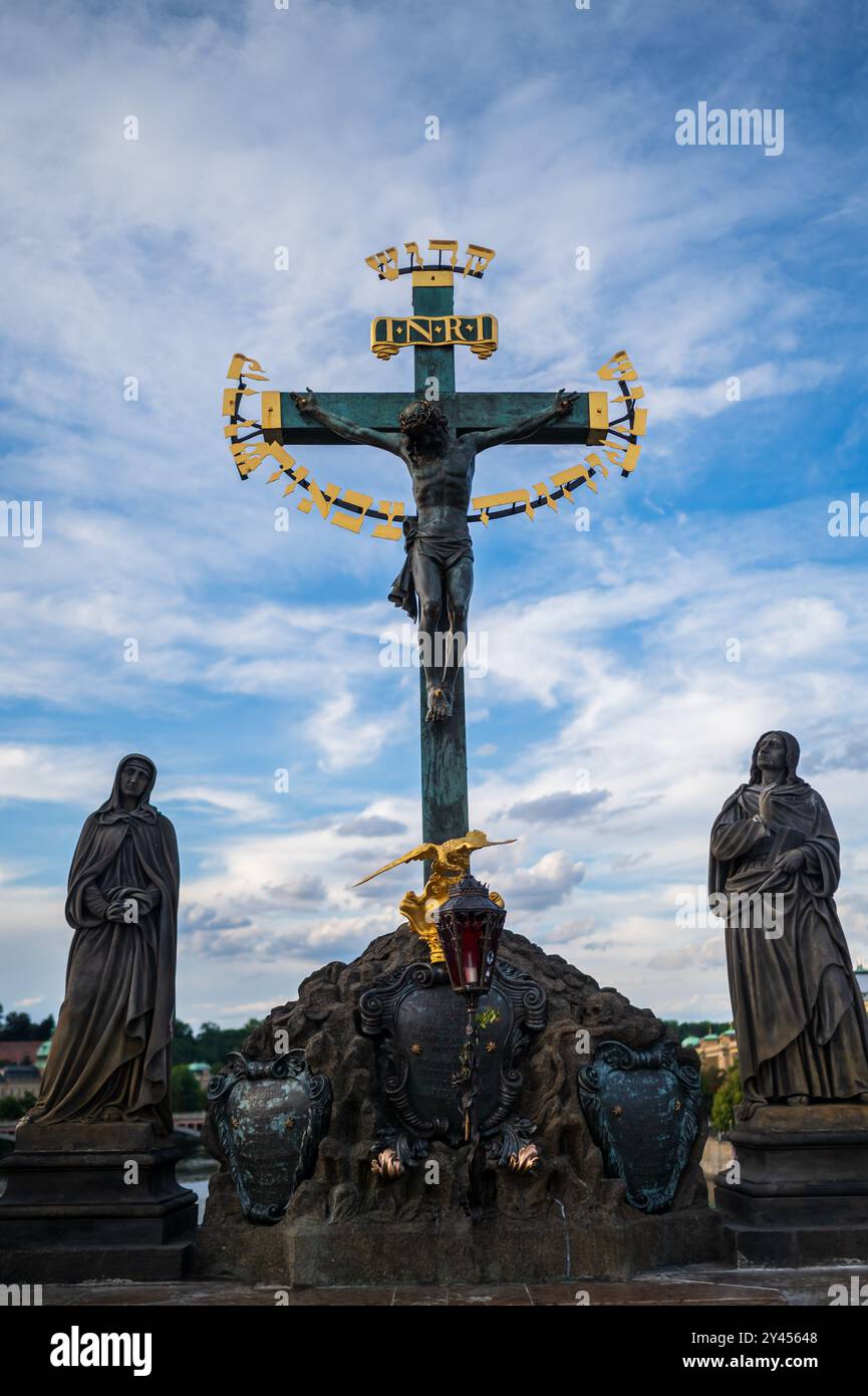 Calvary Cross statue on Charles Bridge in Prague Stock Photo - Alamy