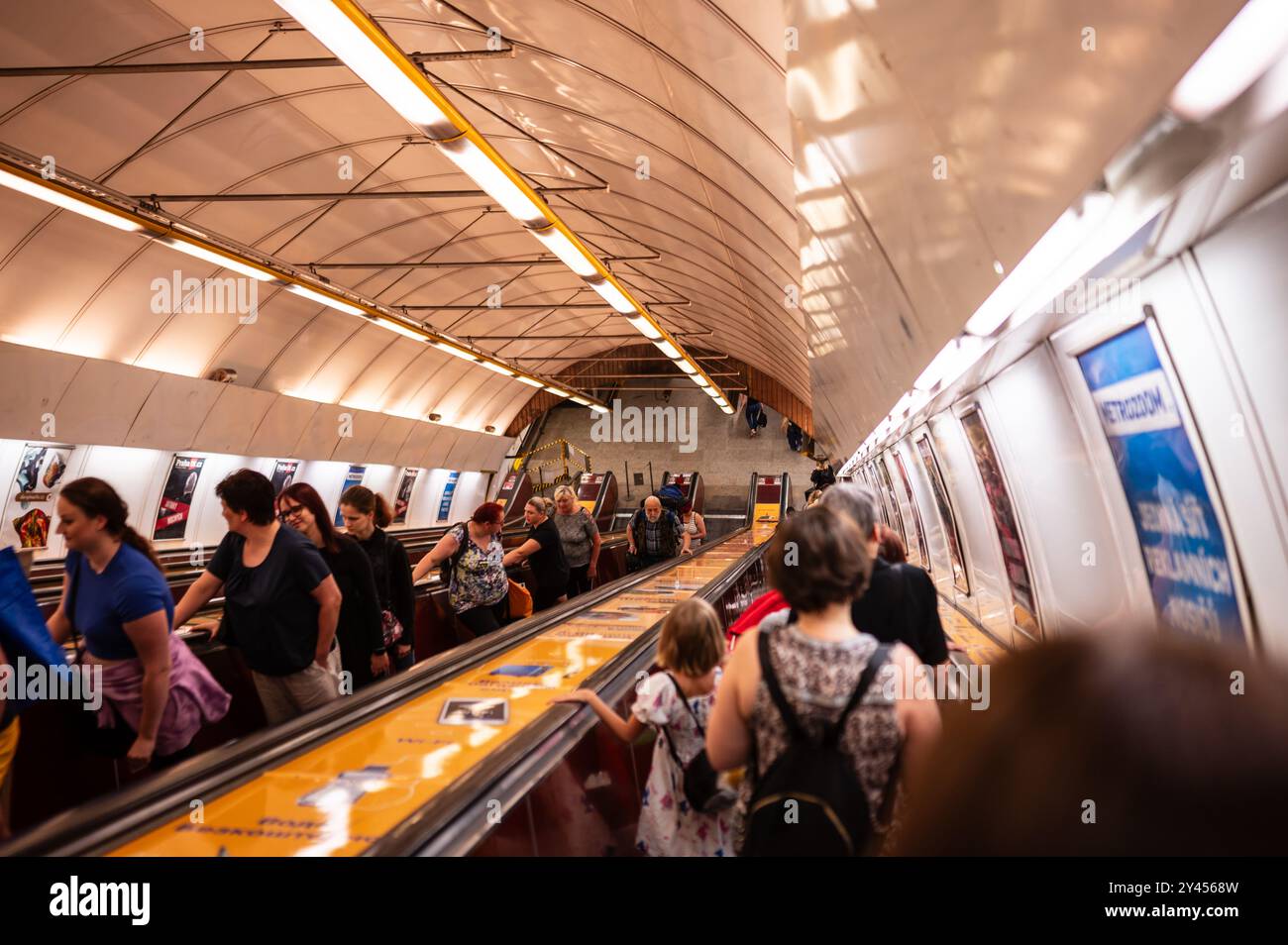 People using Prague Metro electric stairs Stock Photo - Alamy