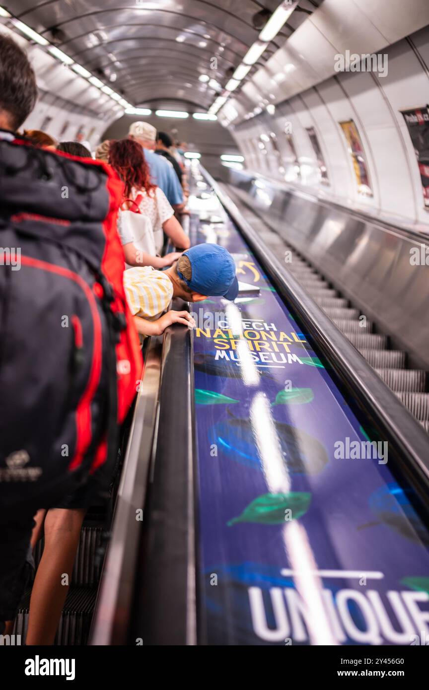 People using Prague Metro electric stairs Stock Photo - Alamy
