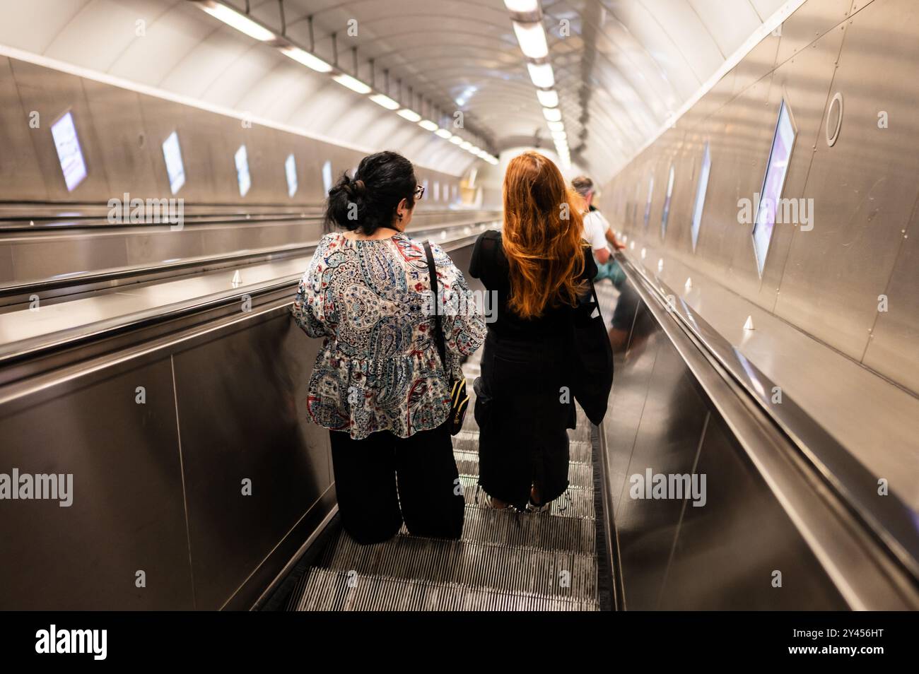 People using Prague Metro electric stairs Stock Photo - Alamy