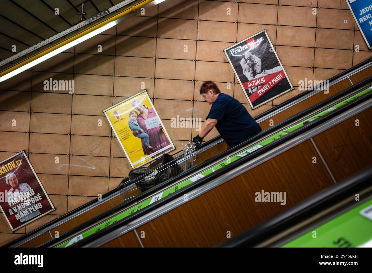 People using Prague Metro electric stairs Stock Photo - Alamy