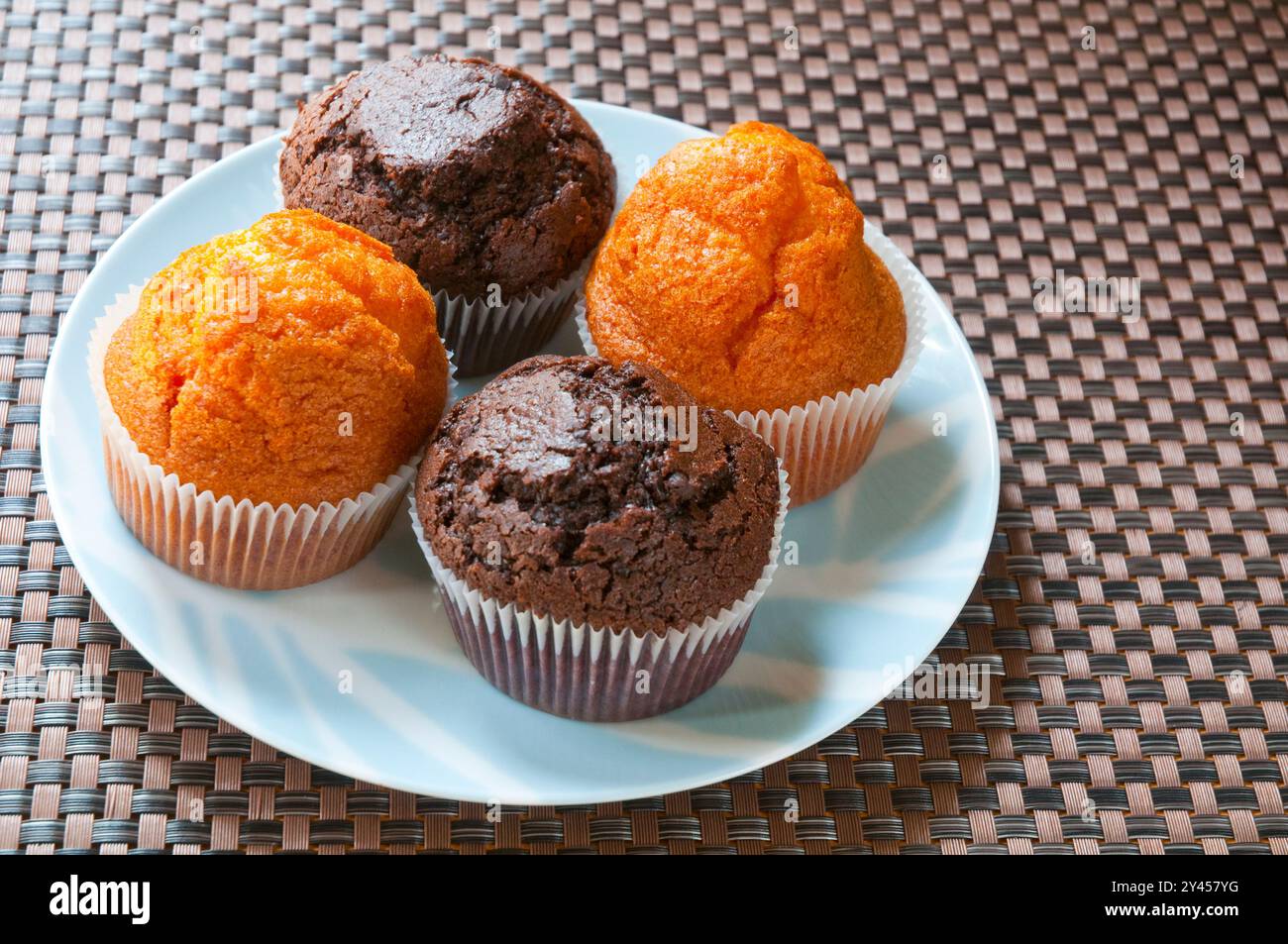 Four homemade delicious muffins hi-res stock photography and images - Alamy