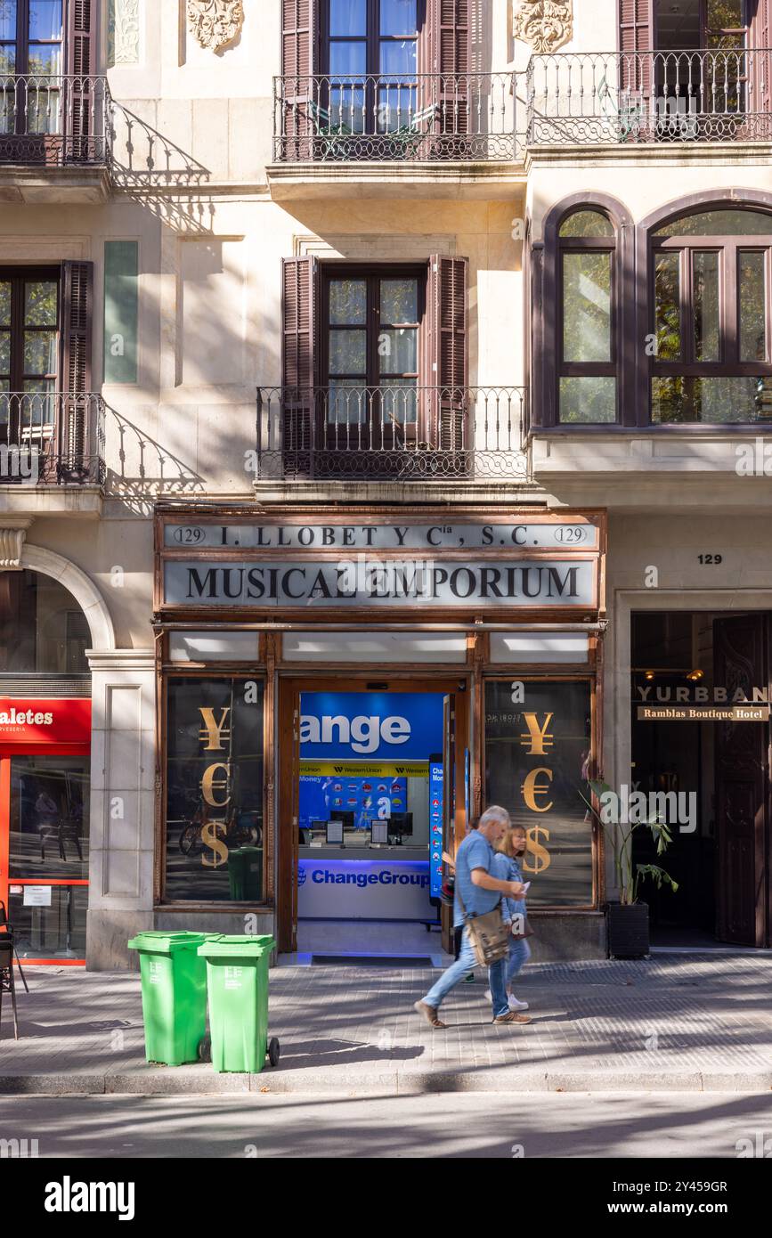 Barcelona, Spain - September 15, 2024: Several people are seen exiting ...