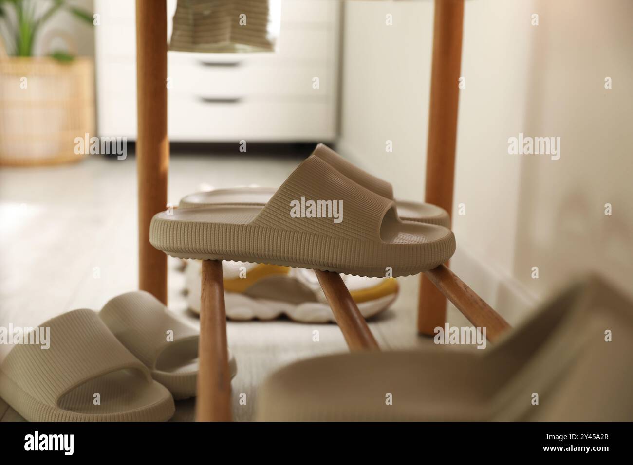 Shoe rack slipper sandal hi-res stock photography and images - Alamy