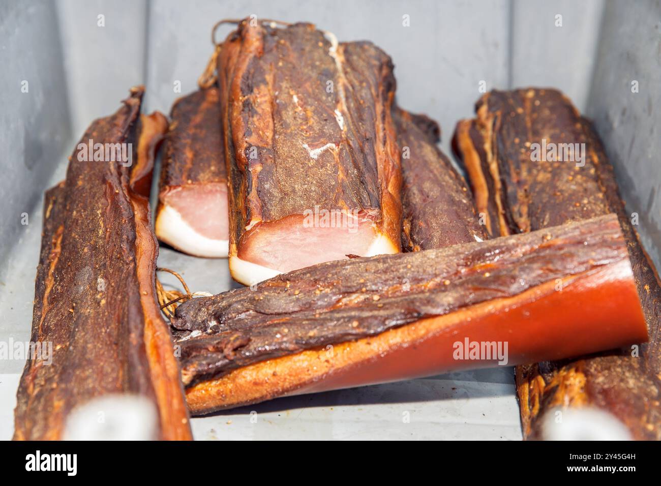 Smoked, cured meat, salted pork belly, traditional preservation method ...