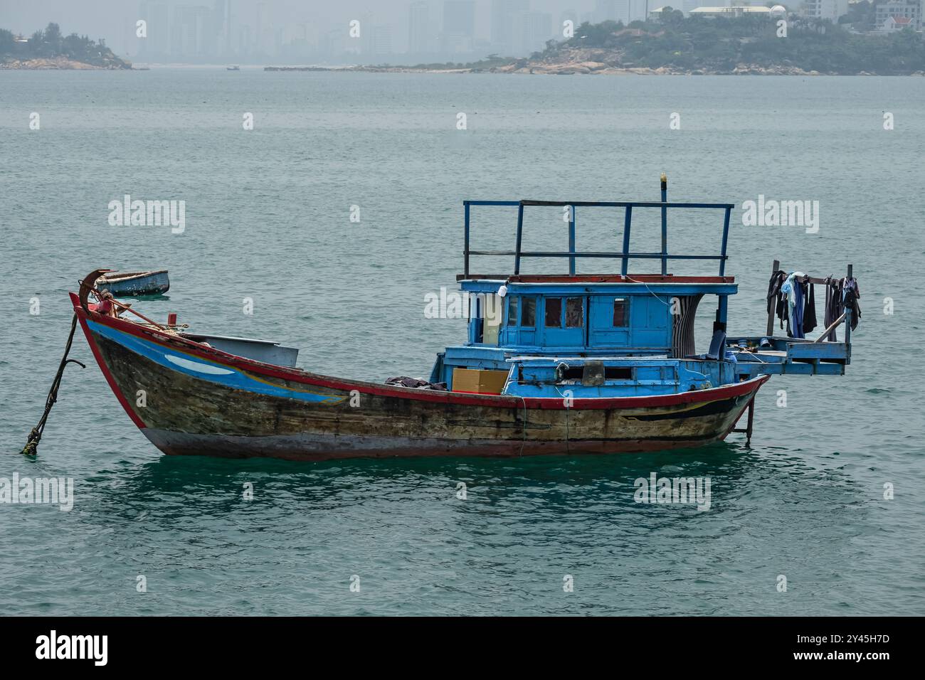 Fishing boats are floating in the sea. Traditional Fishing Vietnamese ...