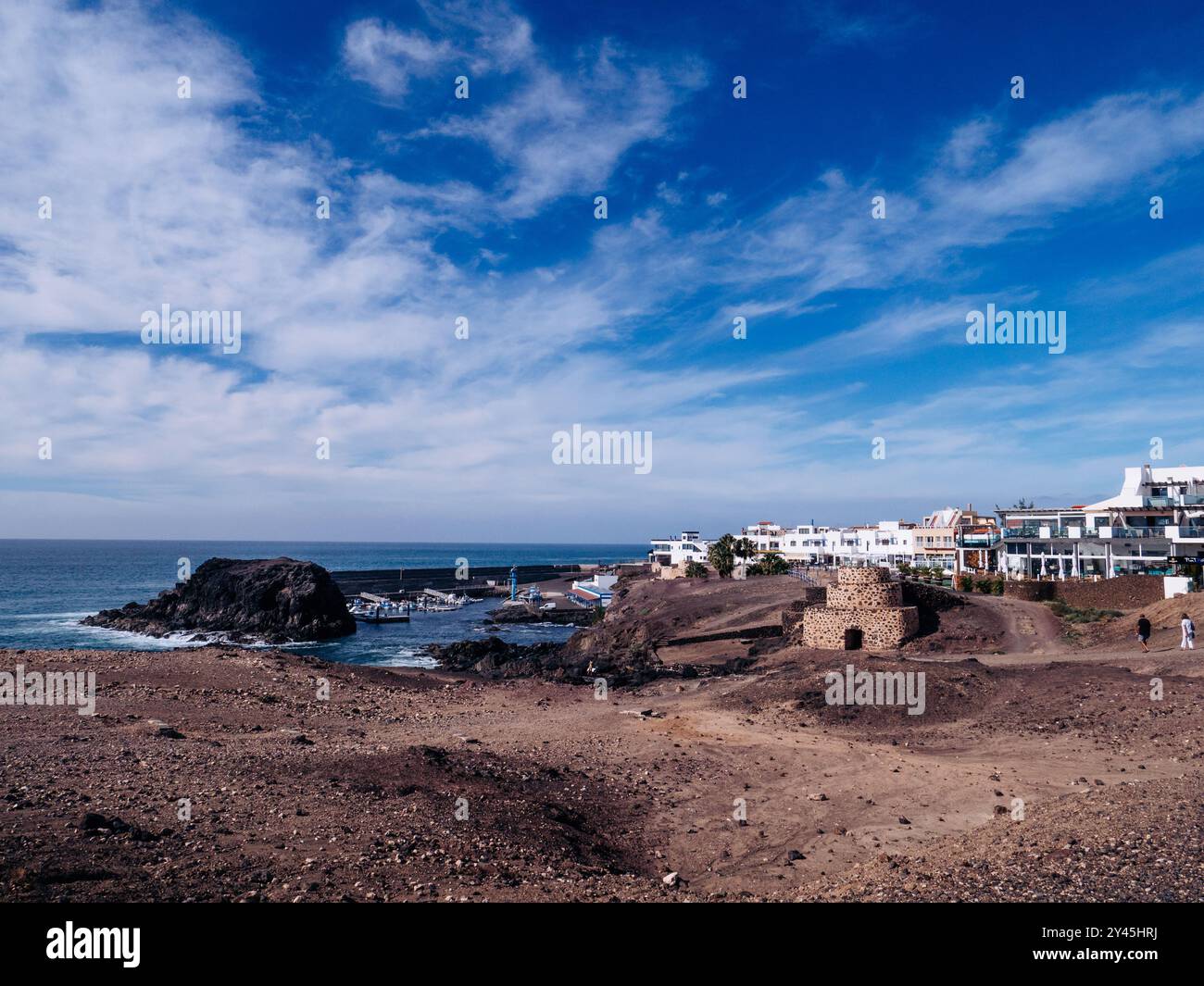 The port and landmark, Antiguo Horno de Cal II (centre) on the ...
