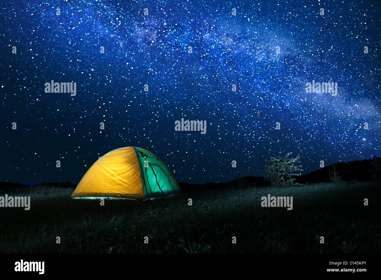 Modern camping tent in wilderness at night Stock Photo - Alamy