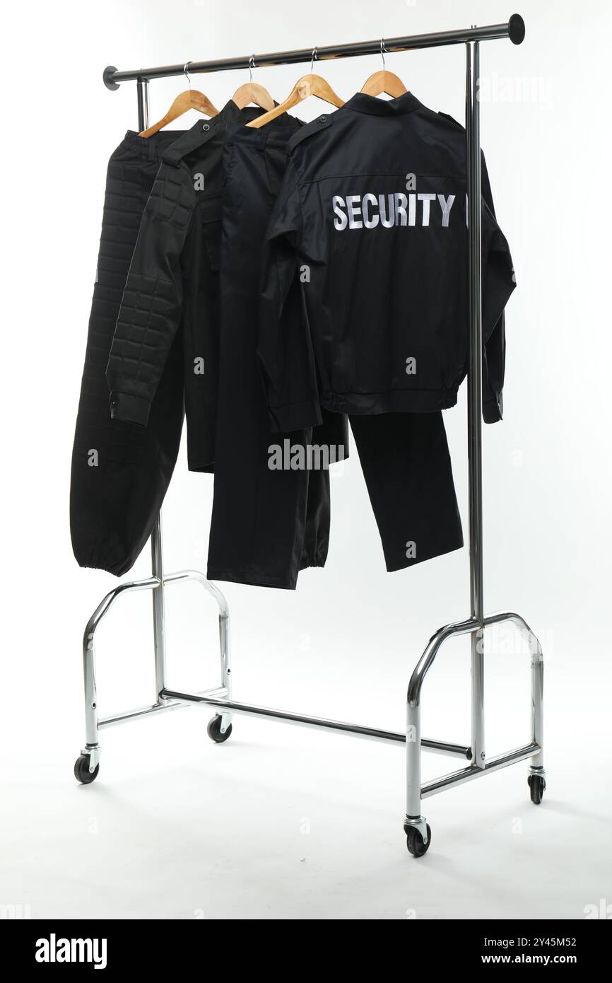 Security guard's uniform on clothing rack isolated on white Stock Photo ...