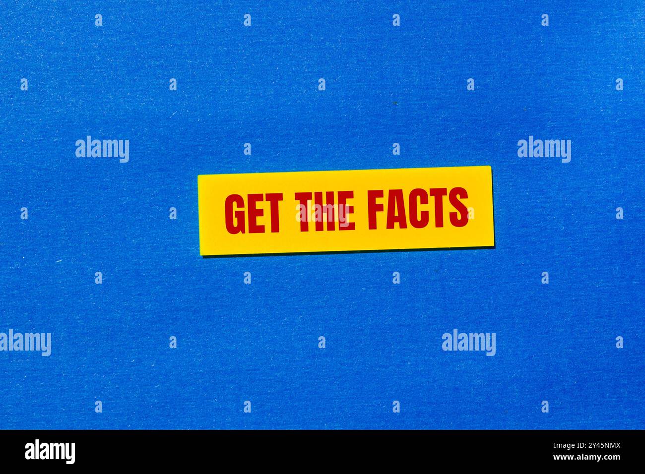 Get the facts message written on yellow sticker with blue background ...