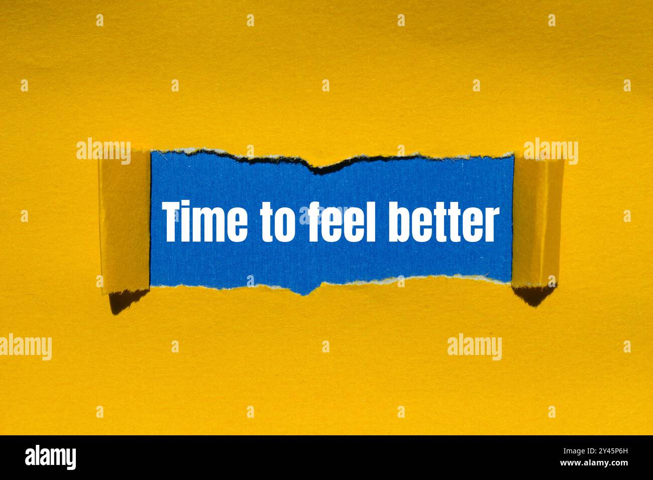Time to feel better message written on ripped torn yellow paper with ...