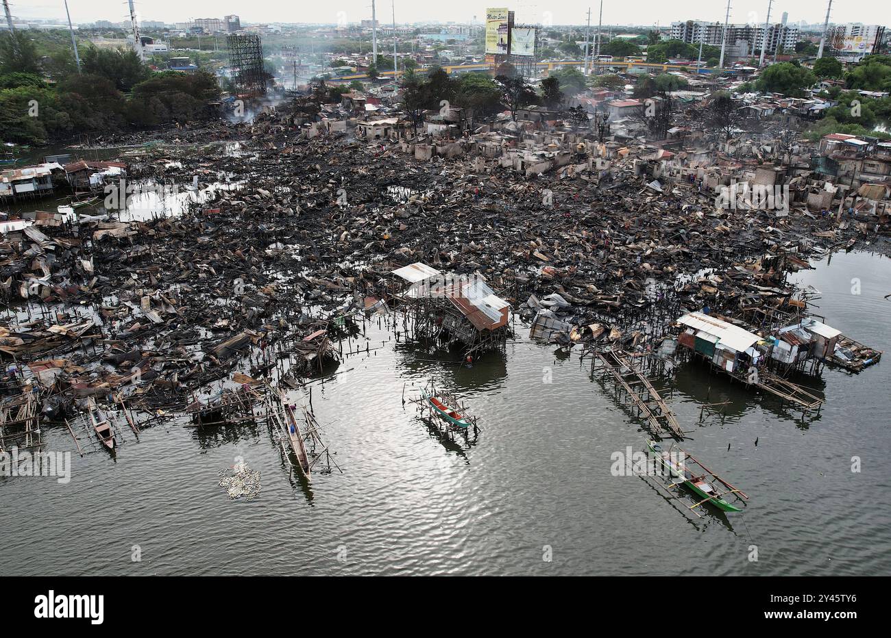 Aftermath of a fire in the Bacoor, Cavite, south of Manila An aerial ...