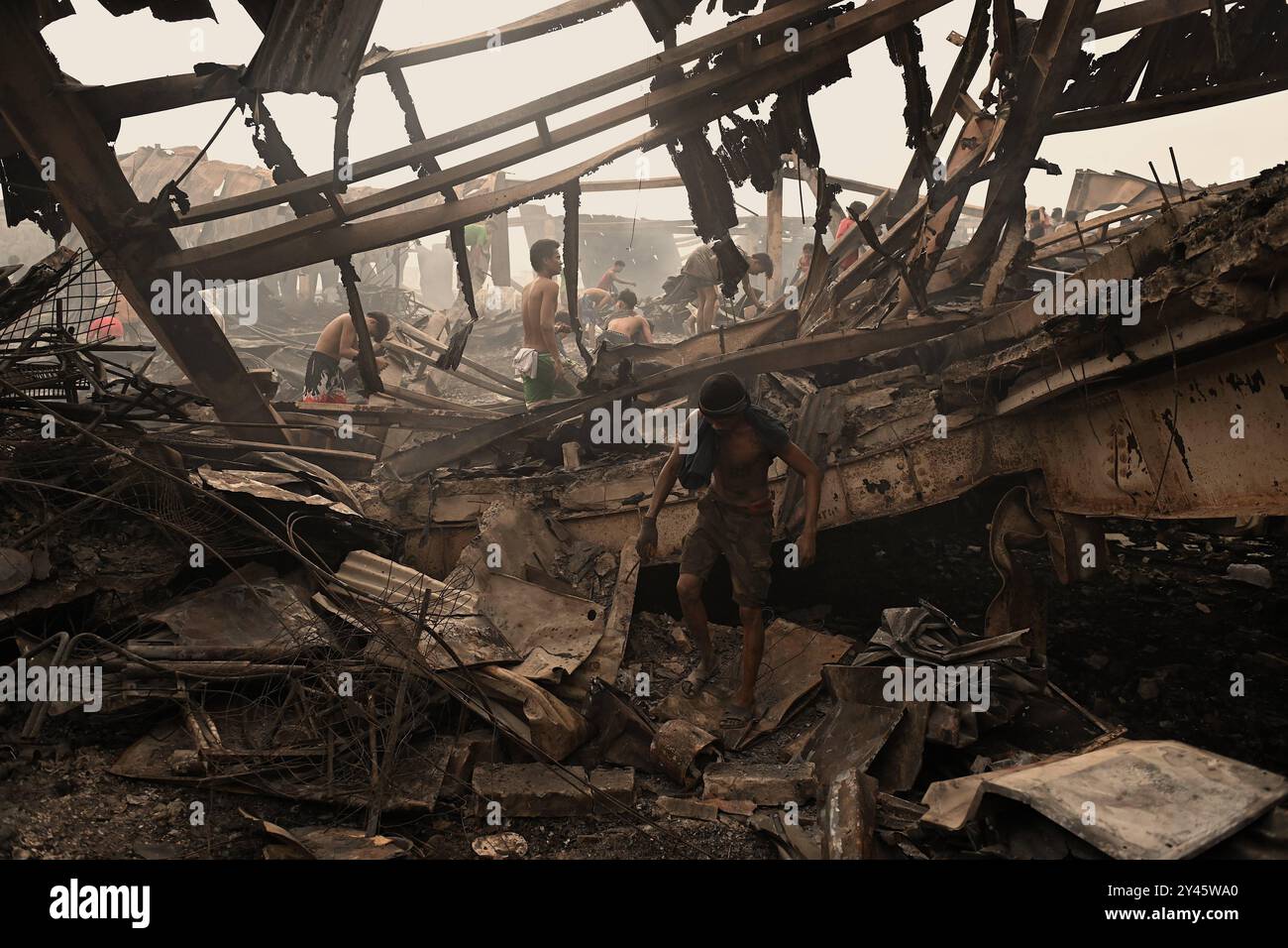 Aftermath of fire in informal settlement in Manila, Philippines People ...