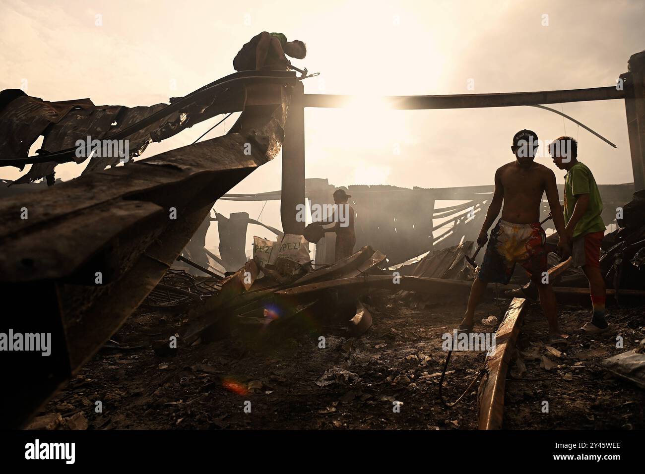 Aftermath of fire in informal settlement in Manila, Philippines People ...