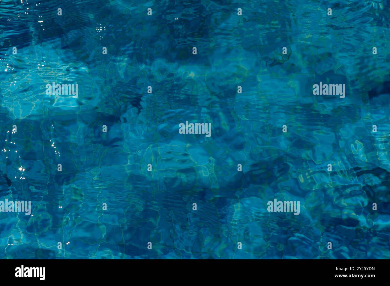 Blue ripped water in swimming pool 3 Stock Photo - Alamy
