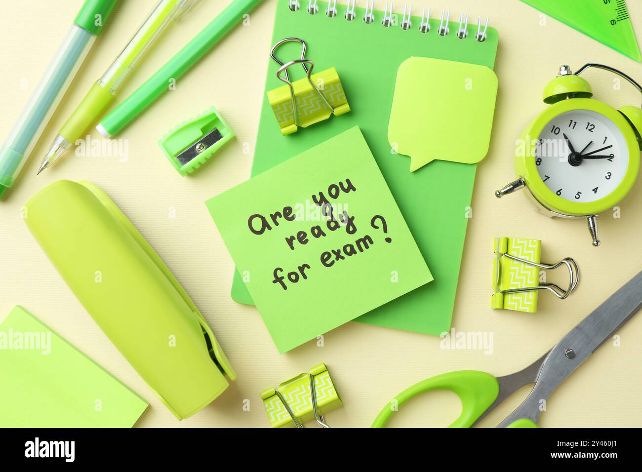 Paper note with question Are You Ready For Exam and stationery on pale ...