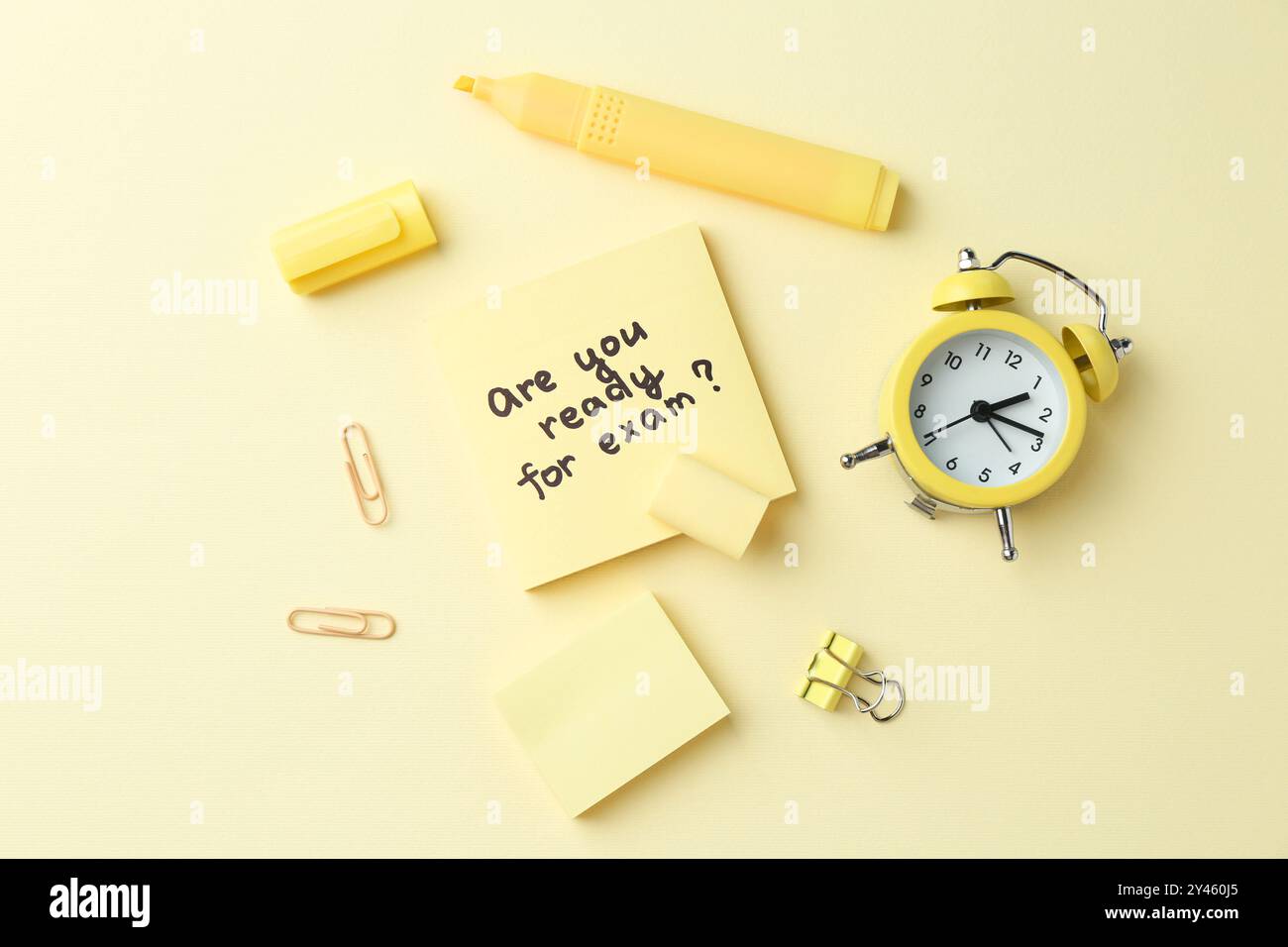 Paper note with question Are You Ready For Exam and stationery on pale ...