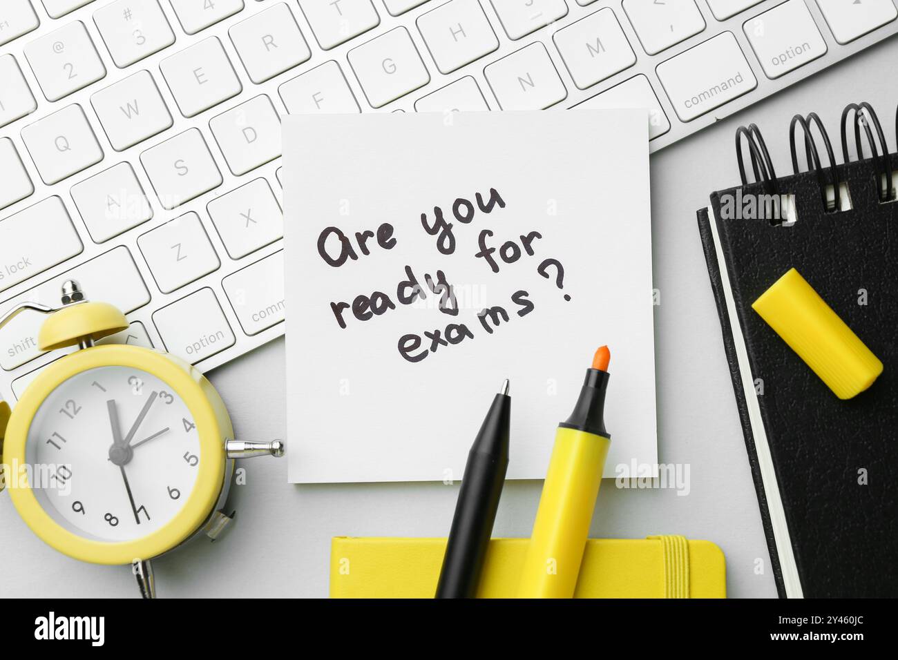 Paper note with question Are You Ready For Exams and stationery on grey ...