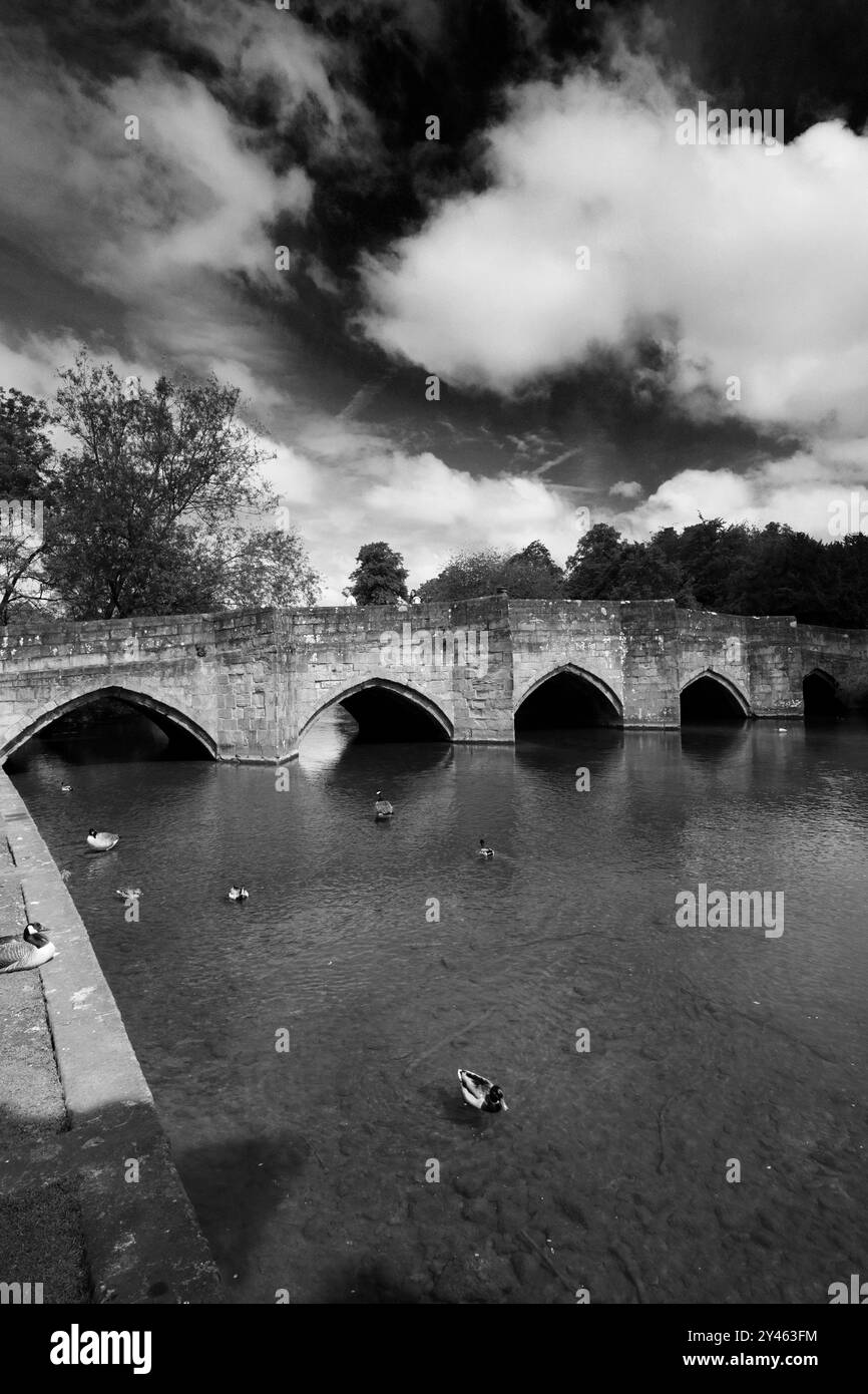 The stone road bridge over the river Wye, Bakewell Town, Peak District ...