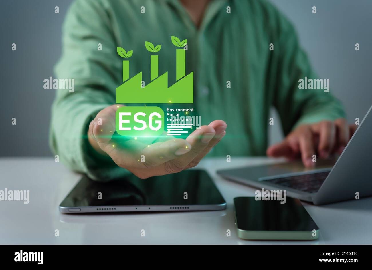 Businessman showing ESG icon to represent analyze sustainable ...
