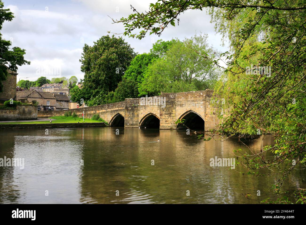 The stone road bridge over the river Wye, Bakewell Town, Peak District ...