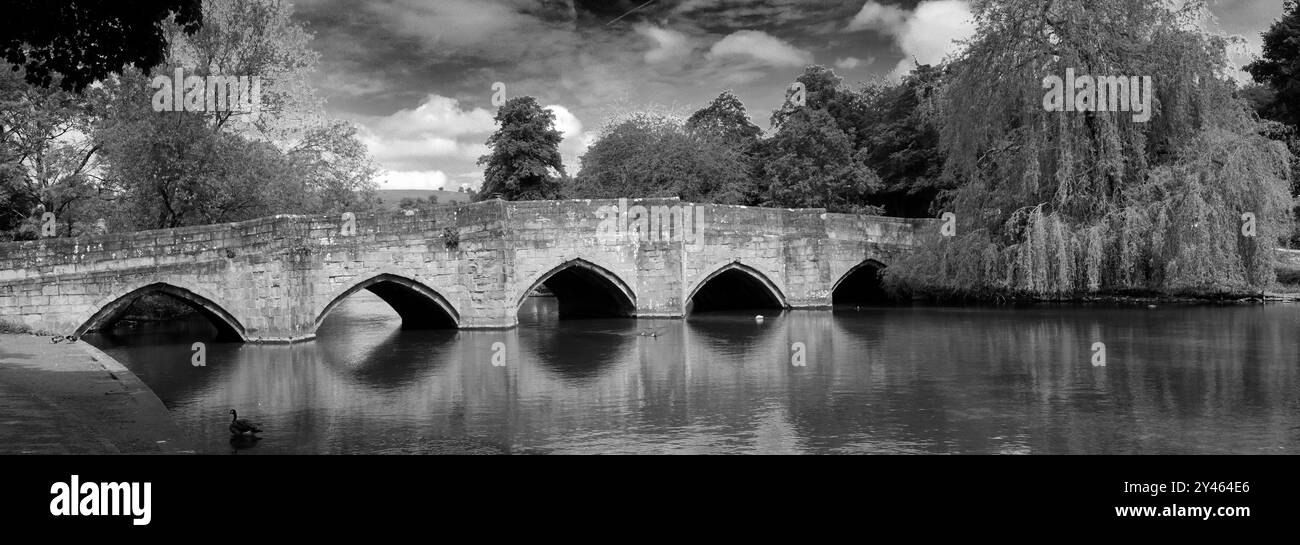 The stone road bridge over the river Wye, Bakewell Town, Peak District ...