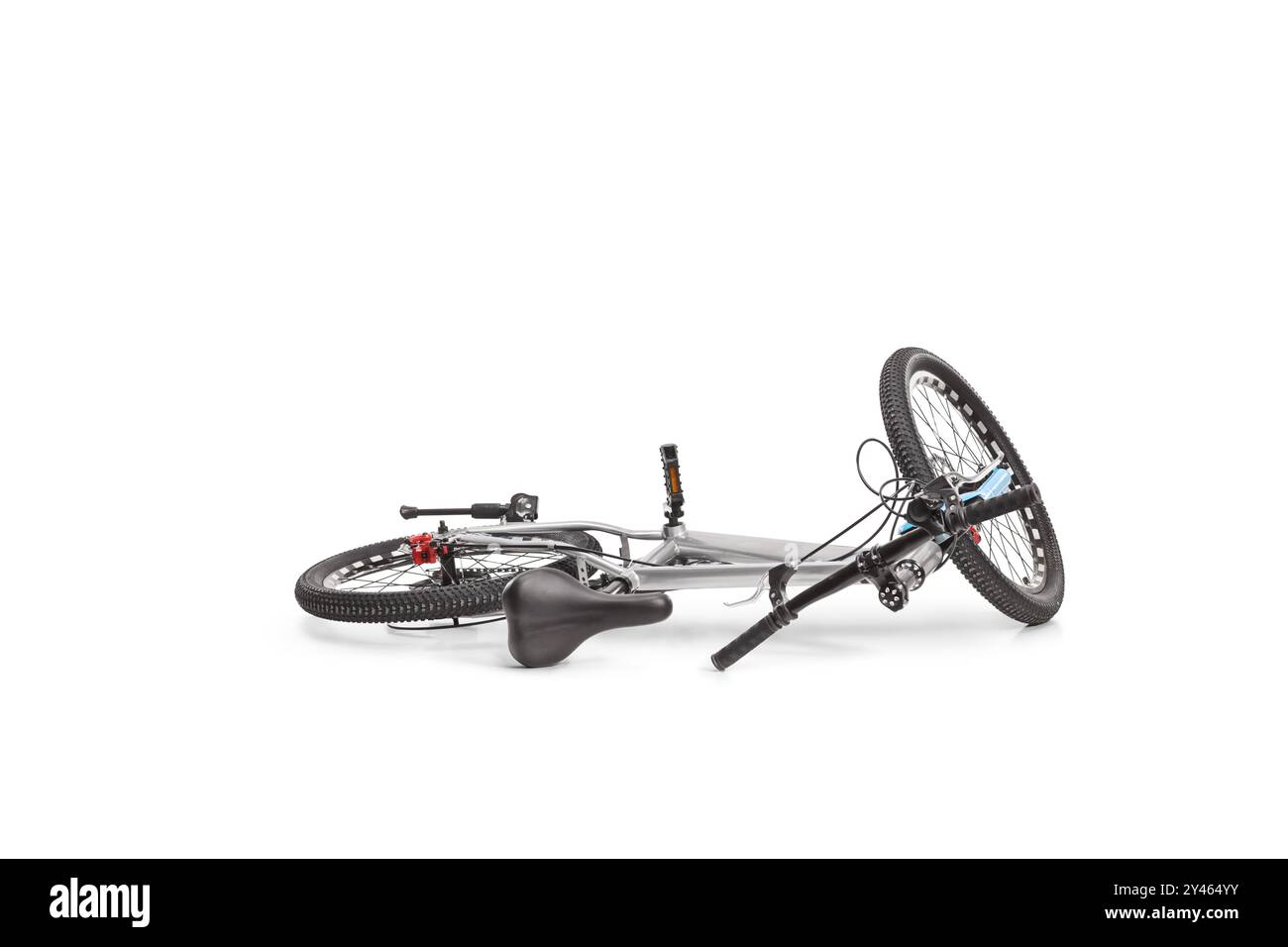 Bike falling on the ground isolated on white background Stock Photo - Alamy