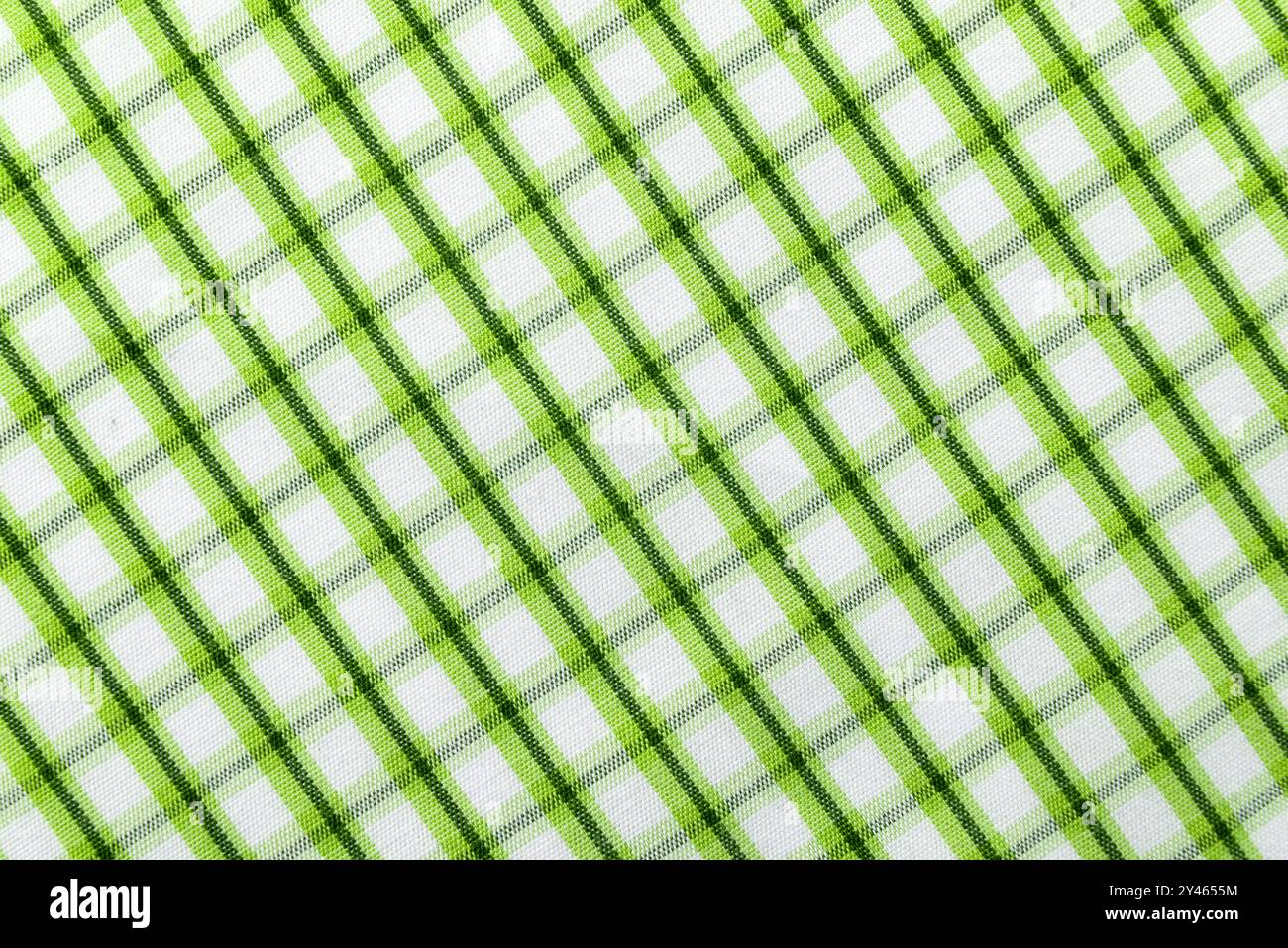 Checkered green fabric. Textile. Checkered fabric background with red ...