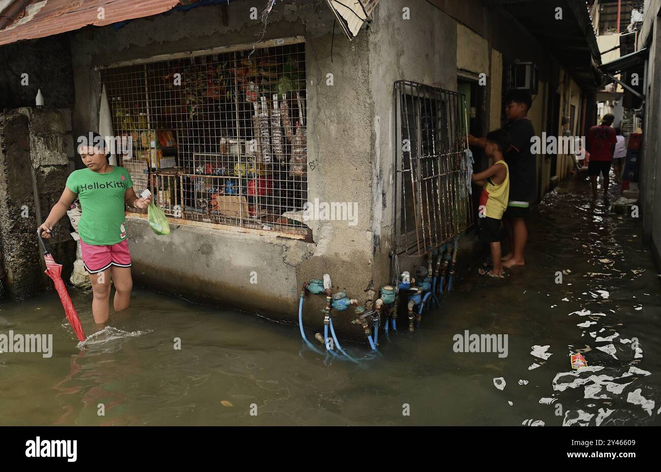 Flooding caused by typhoon Yagi in Philippines People buy goods at a ...