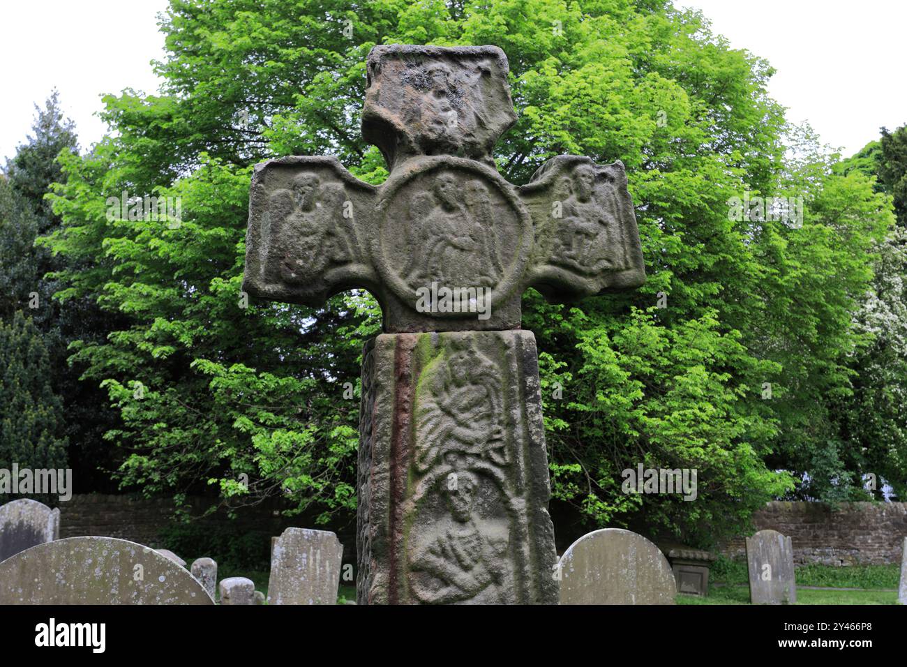 The 8th Century Saxon cross at St Lawrence's Church, Eyam village ...