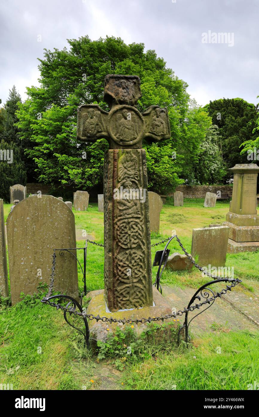 The 8th Century Saxon cross at St Lawrence's Church, Eyam village ...