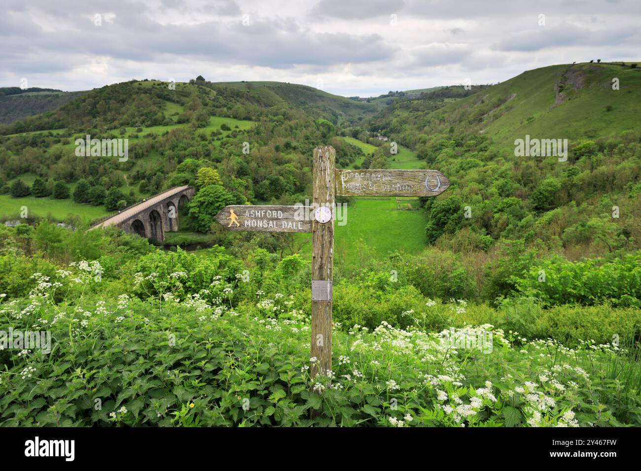 View over the old railway viaduct at Monsal Head, river Wye, Peak ...