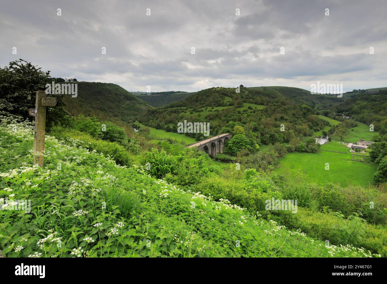 View over the old railway viaduct at Monsal Head, river Wye, Peak ...